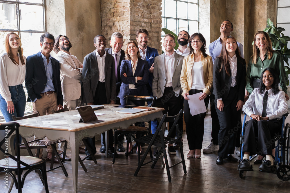 Executive team of a successful company taking a joint photo after the ...
