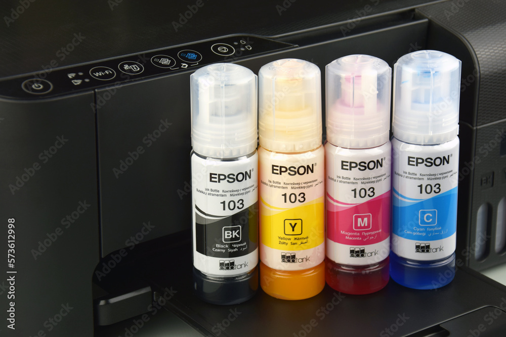 Four bottles of ink Epson, yellow, red, blue, black, built-in to the ...