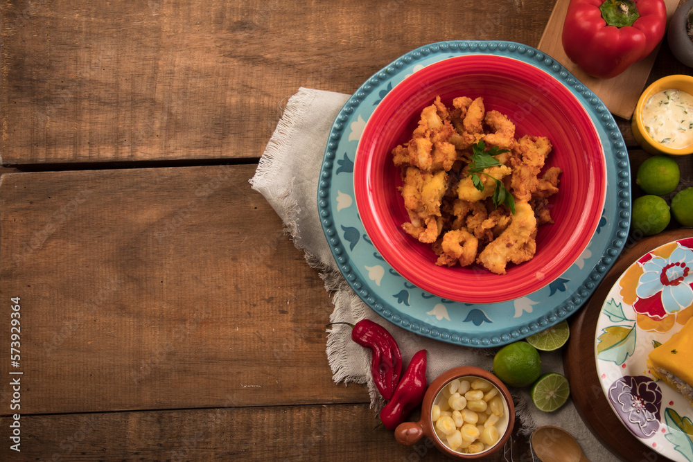 Chicharrón de pota pescado fish sticks Sea food ceviche Assorted food ...