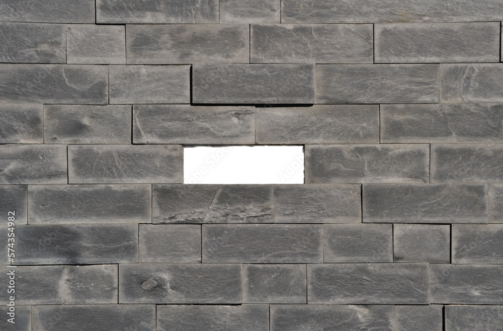 Wall surface texture with slate bricks of different sizes and uneven ...