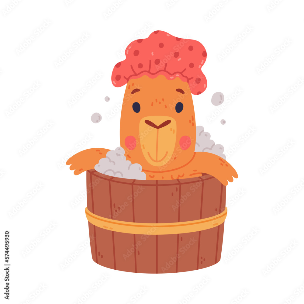 Cute baby capybara taking bath in wooden tub. Funny animal of South ...
