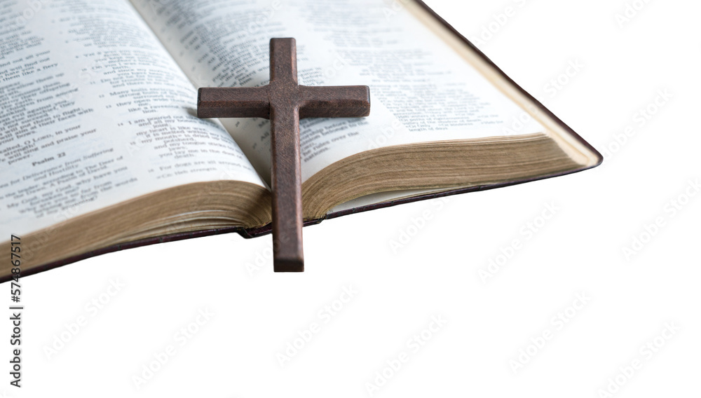 Wooden cross crucifix on top of an open bible. Isolated, transparent ...