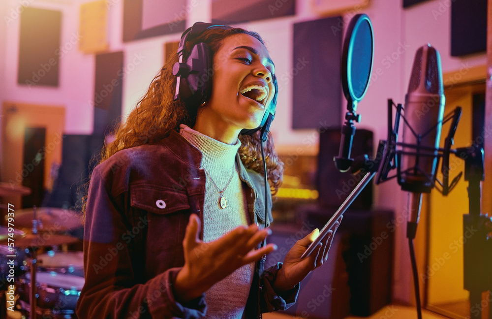 Tablet, music and woman singing in a studio for radio, song production ...