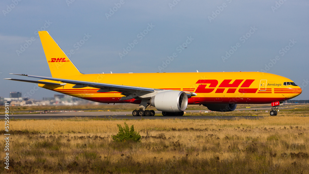 DHL operated by AeroLogic Boeing 777F Freighter Stock Photo | Adobe Stock