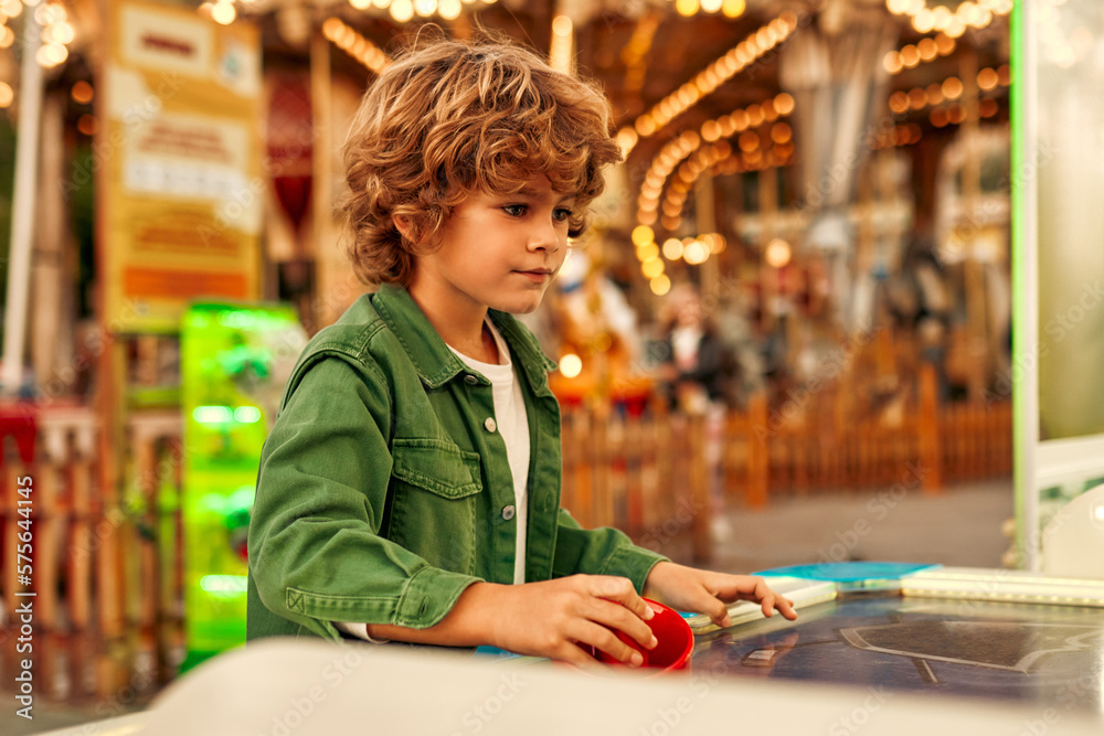 Kids having fun on a carnival Carousel Stock Photo | Adobe Stock
