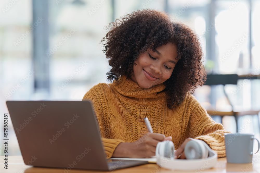 Photo Stock Young black African woman university student learning ...