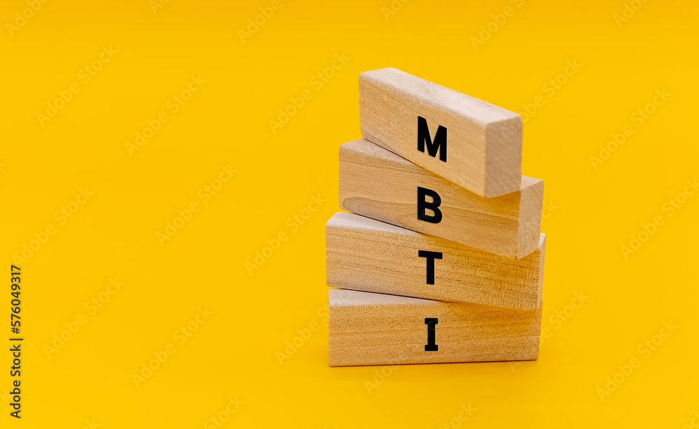 Four wooden blocks with the letter MBTI, Myers-Briggs Type Indicators ...