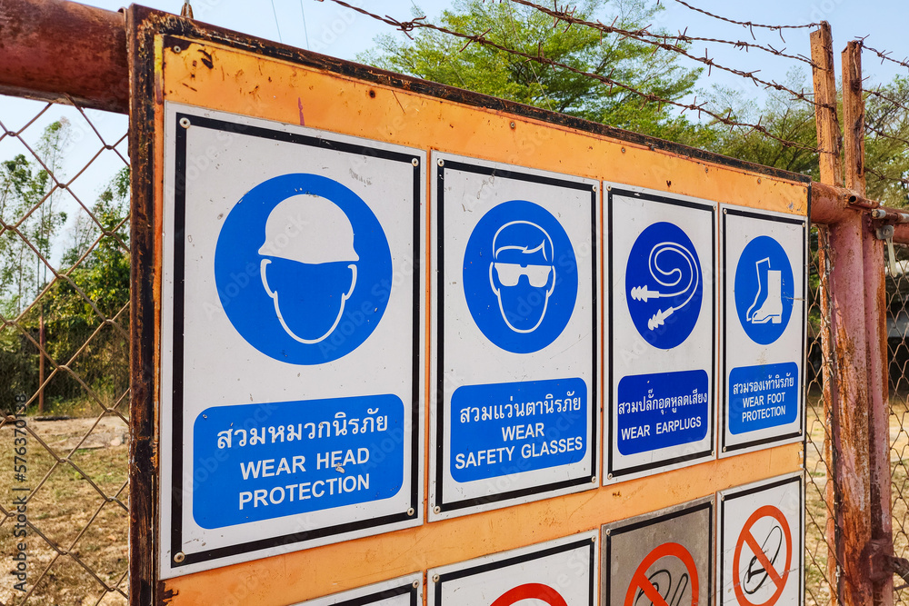 Various type of safety PPE requuired symbol icons in English and Thai ...