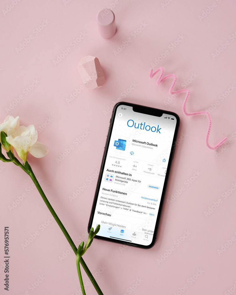Mobile phone with Outlook App Store screen Stock Photo | Adobe Stock