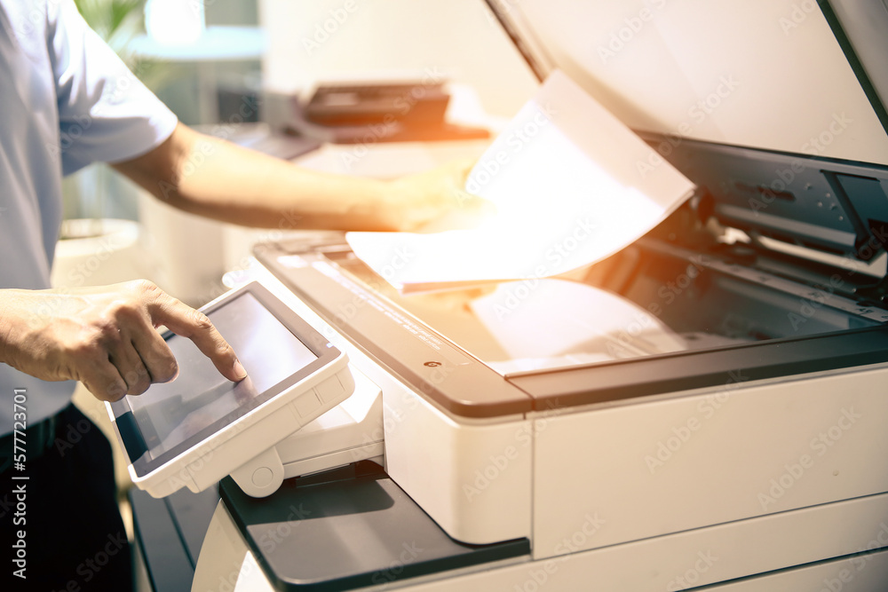 Photocopier printer, Close up hand office man press copy button on ...