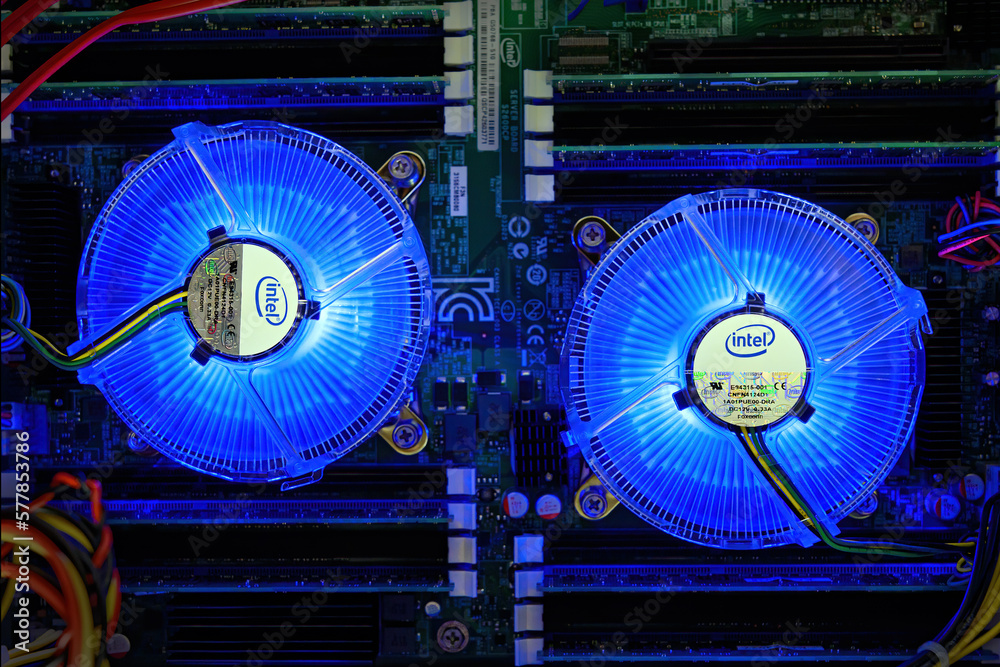 Glowing Intel fans on CPU’s in a dual processor computer. Fans are ...