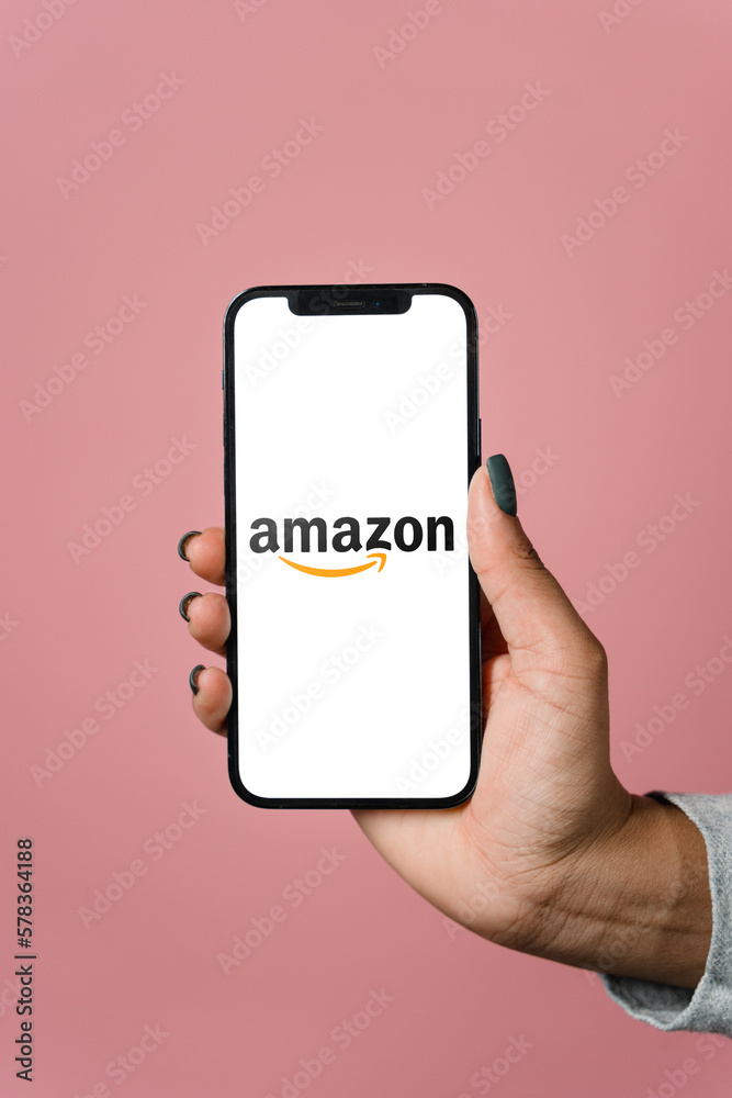 Mobile phone with the Amazon Logo on the screen Stock Photo | Adobe Stock