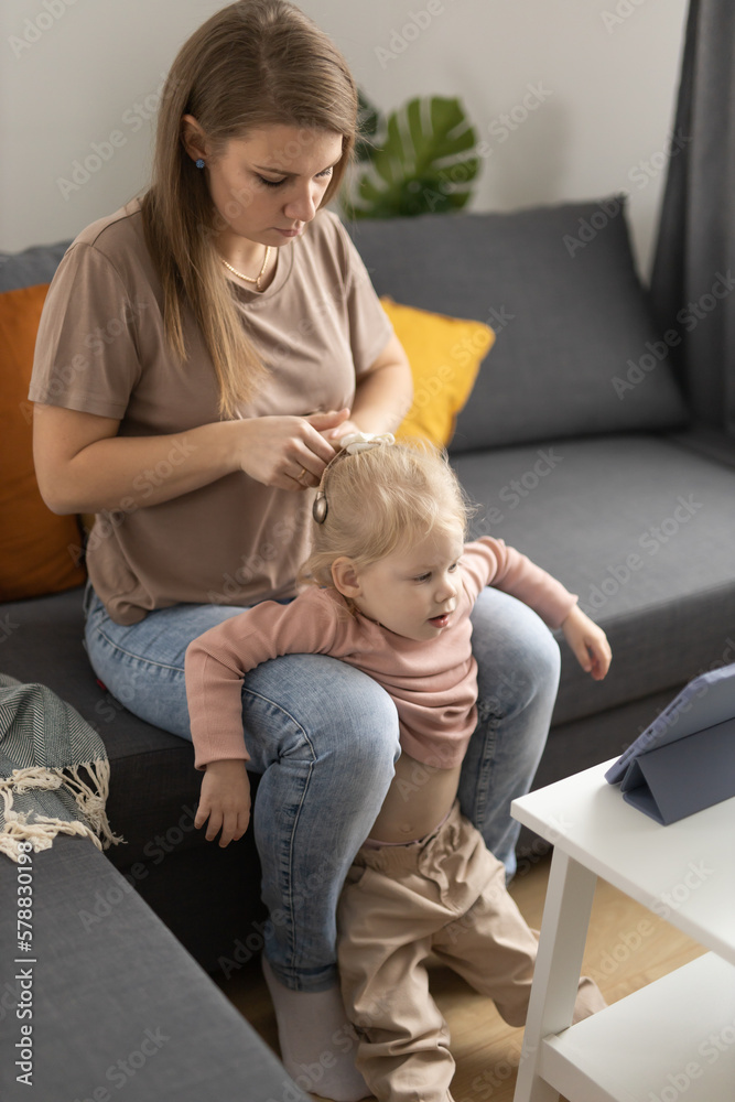Deaf child girl with cochlear implant studying to hear sounds ...