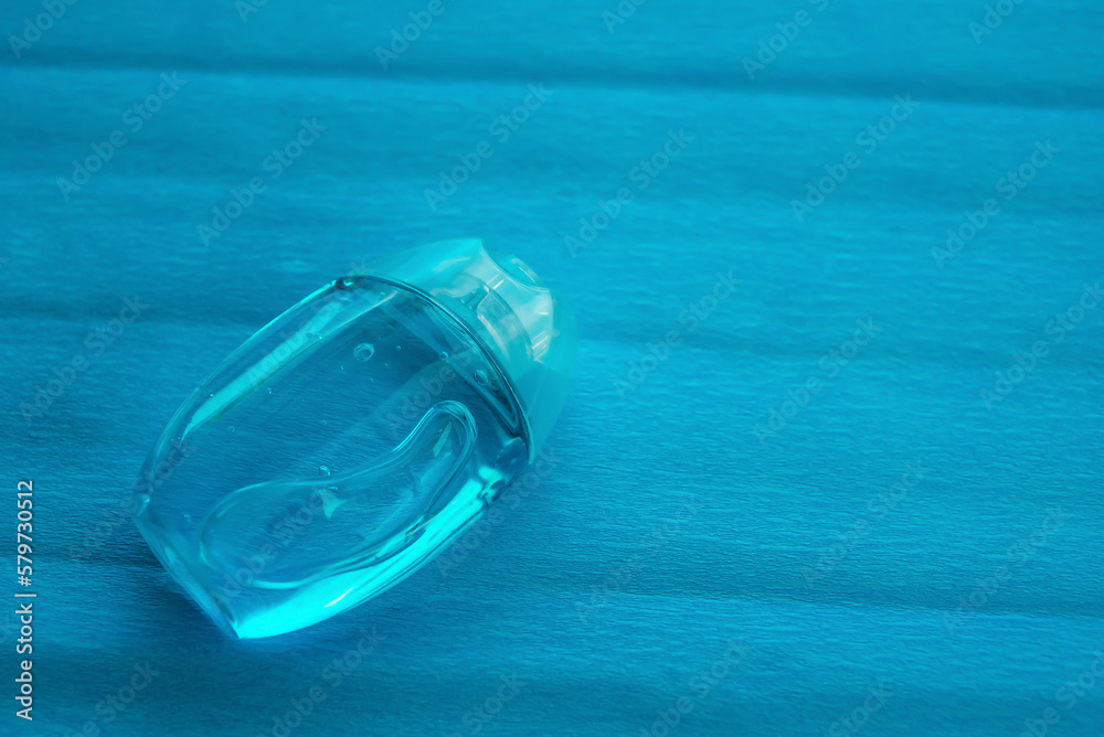 Pocket antiseptic hand sanitizer gel isolated on blue background, no ...