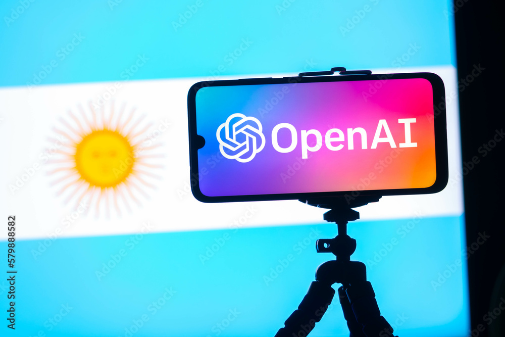 OpenAI logo shown on a smartphone screen and the Argentine flag in the ...