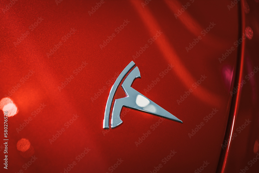 Tesla brand logo sign business symbol on EV car hood by Elon musk ...
