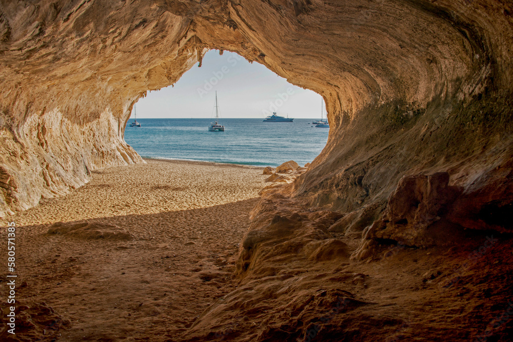 Inside a cave at Cala Luna beach on the Italian island of Sardinia ...
