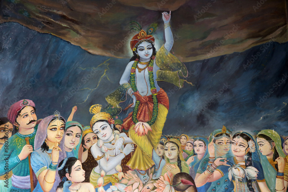 Painting depicting Hindu god Krishna lifting Goverdan hill. Vrindavan ...