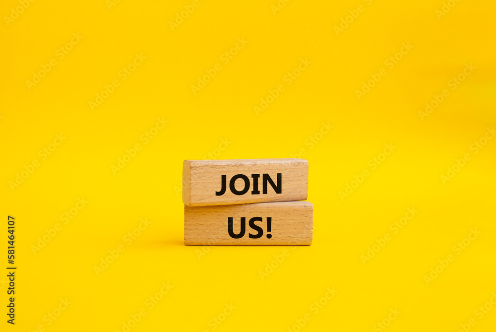 Join us symbol. Concept word Join us on wooden blocks. Beautiful yellow ...