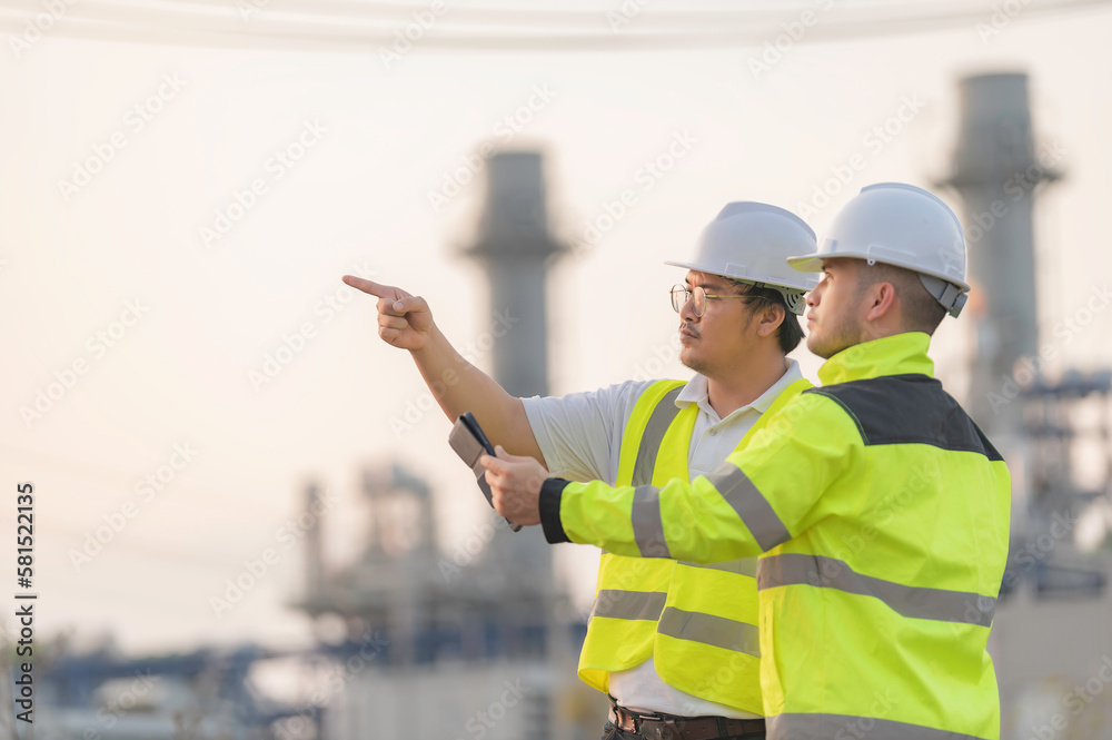 Group Asian man petrochemical engineer working at oil and gas refinery ...