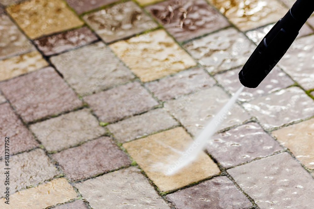 Cleaning Pavement Paving Stones with High Pressure Washer. Pressure ...
