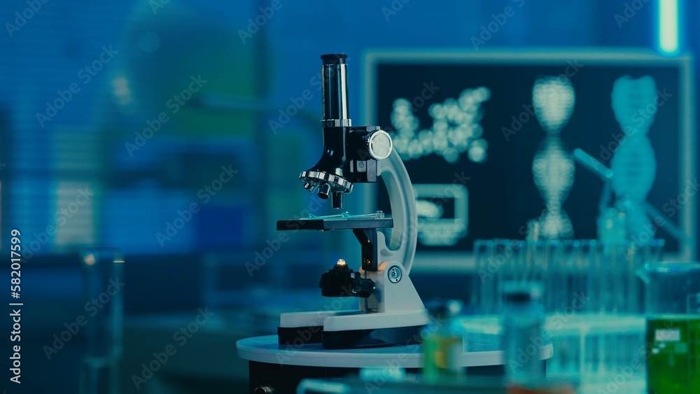 Photo Stock Microscope, glass test tubes and flasks on the background ...