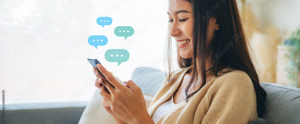 Young asian woman using mobile smartphone. Chatting conversation in ...