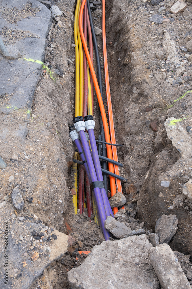 underground electric cable infrastructure installation. Construction ...