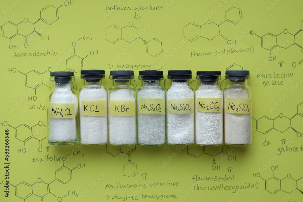 White crystalline substances in glass jars: ammonium chloride ...