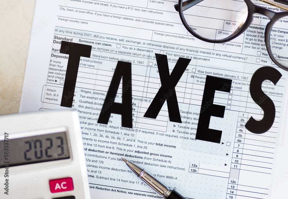 Individual income tax return form for tax payment on working desk ...