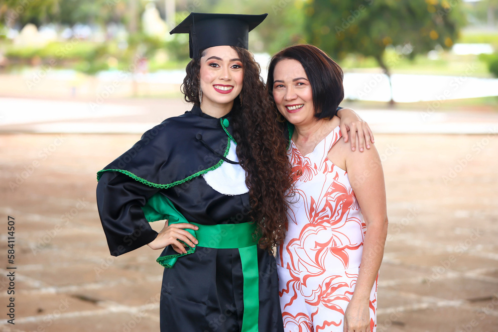daughter graduating, girl, woman graduating, graduation, smiling ...