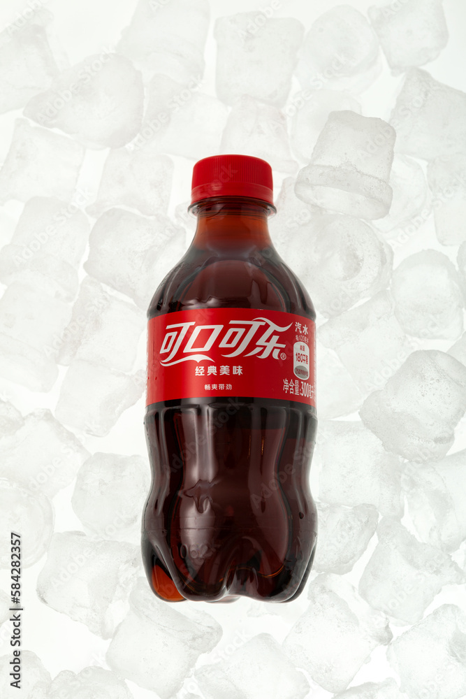 Moscow, Russia, March 22, 2023. Chinese Bottle of Coca-Cola in ice ...