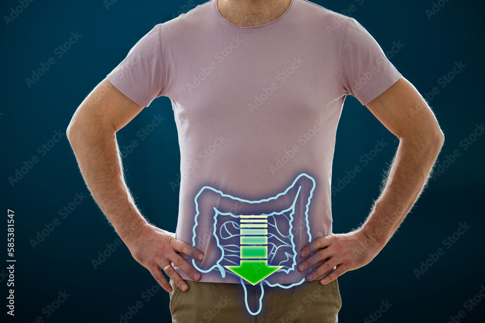 The man standing on a dark background. Picture of a human digestive ...