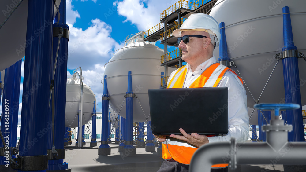Foto de Stock Chemical plant supervisor. Man with laptop. Guy on ...