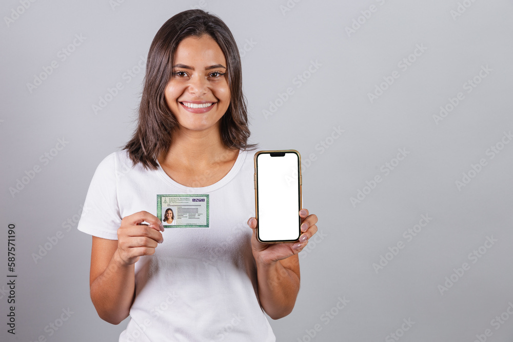 Brazilian woman, with Brazilian identity card, RG, document. Smartphone ...
