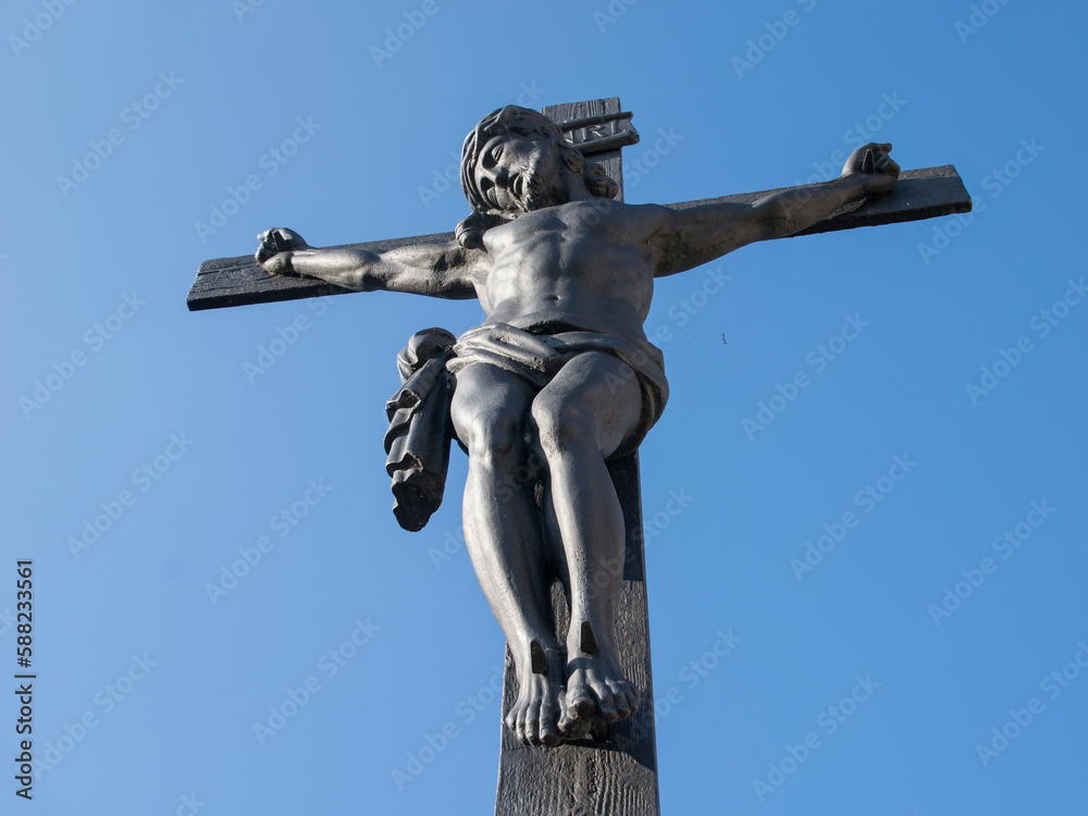Statue of Jesus Christ crucified on the cross Stock Photo | Adobe Stock