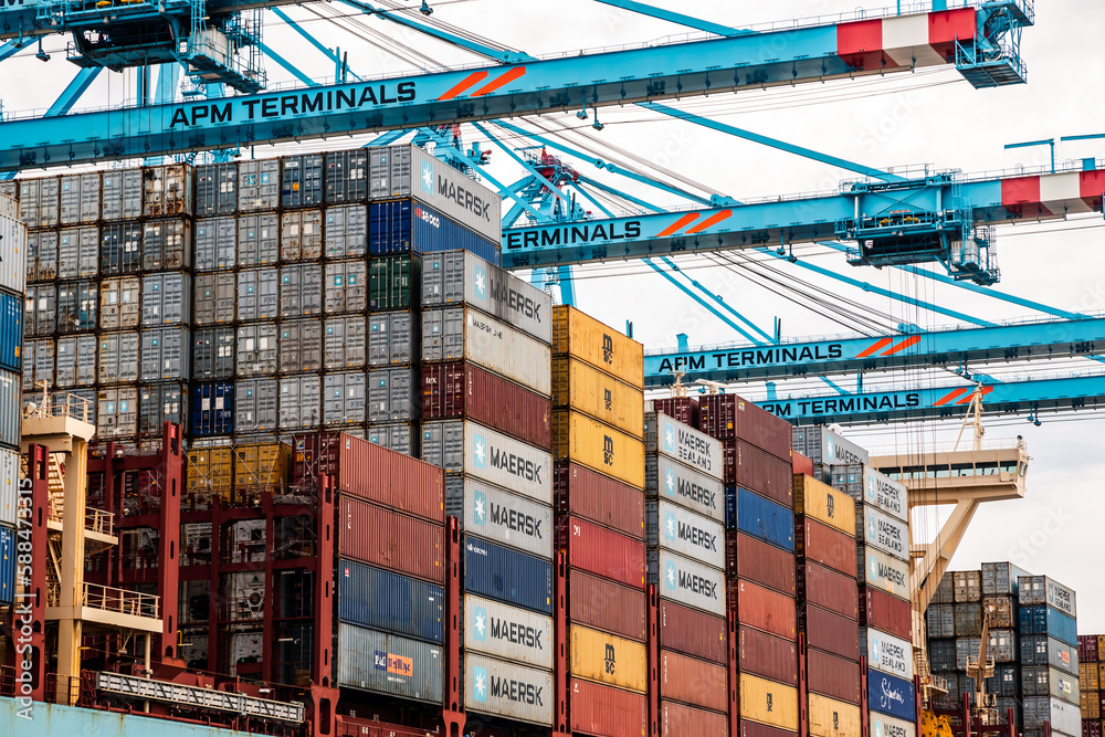 Shipping containers are placed on a ship in the APM Terminal in the new ...