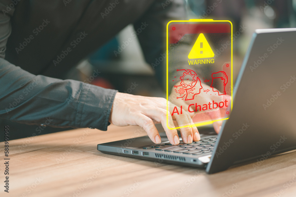 Adult man using laptop chatting with a smart AI using an artificial ...