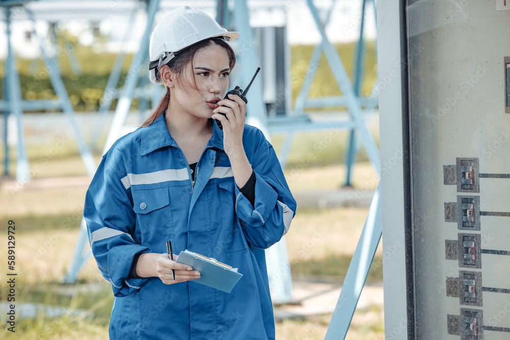 Solar electric installer and practitioner inspect electrical systems ...
