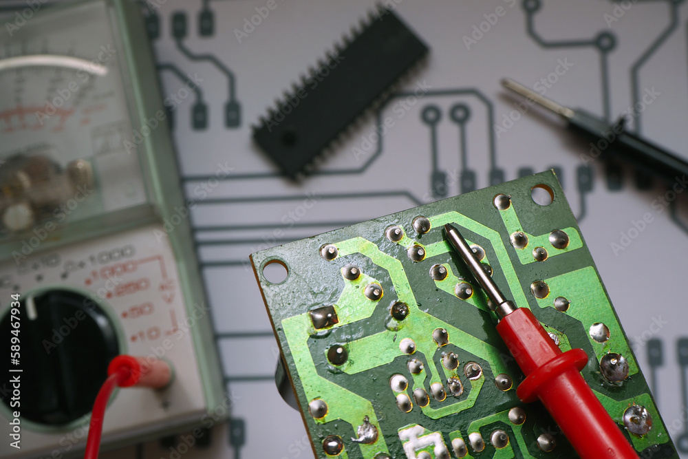 Electronic repair bench. Electronic circuit board with blurred ...