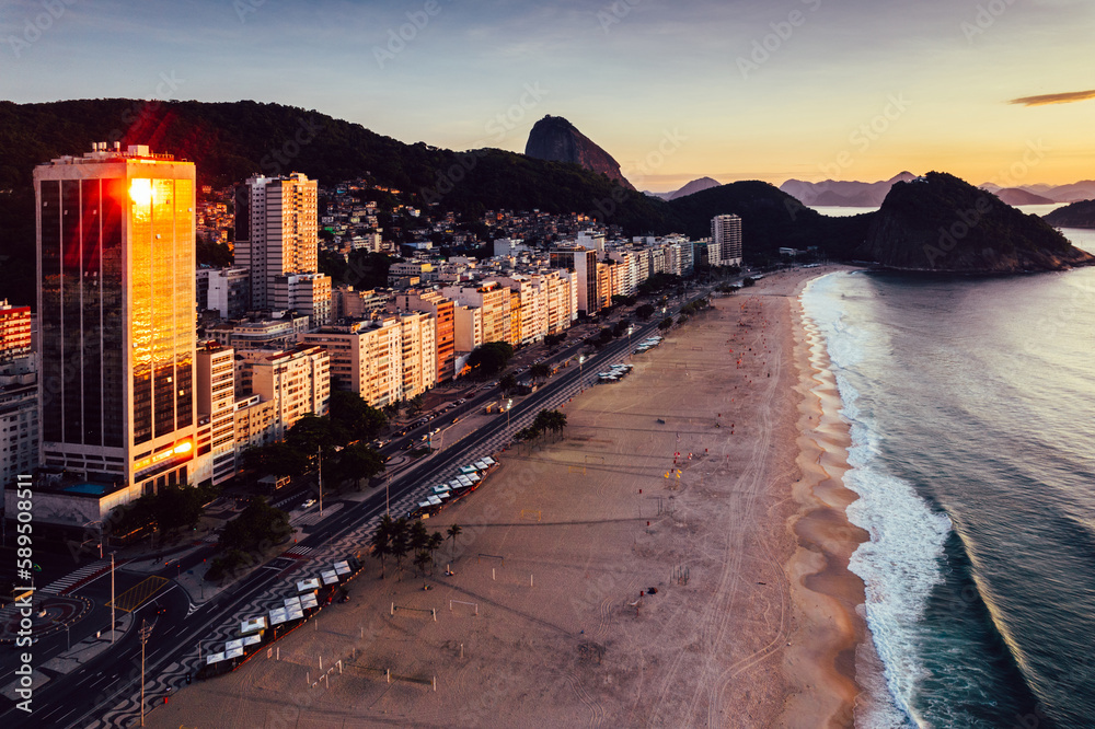 Aerial drone view of Leme Beach in the Copacabana district at sunrise ...