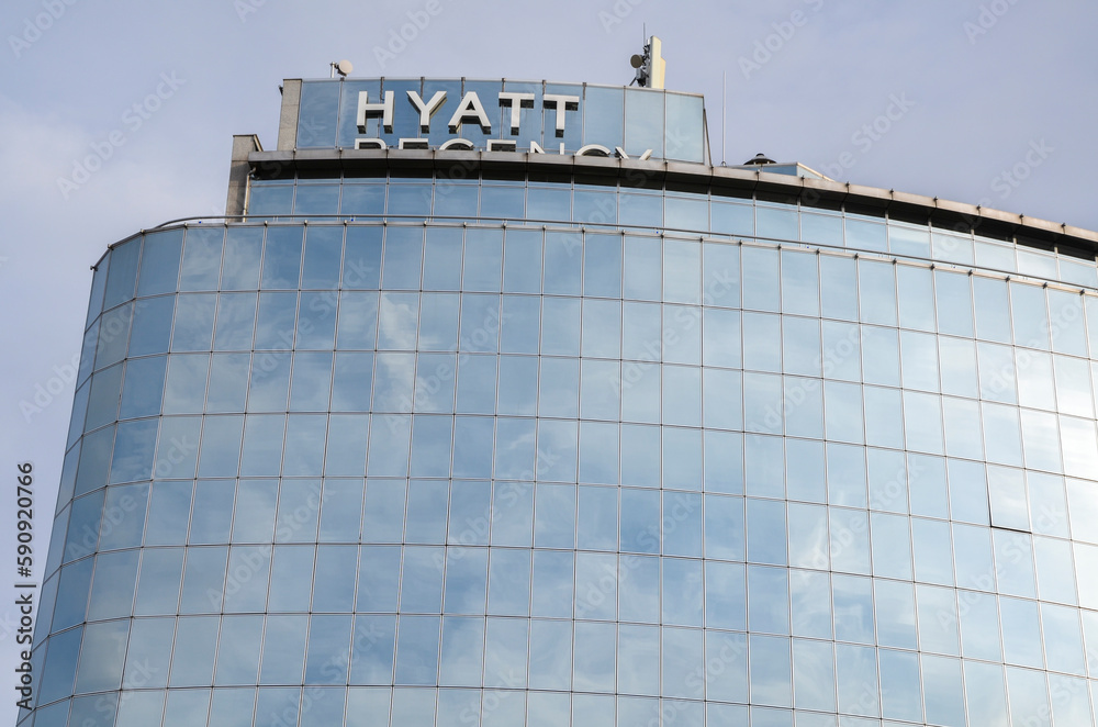 Glass facade of Hyatt Regency hotel modern building near Sofia square ...