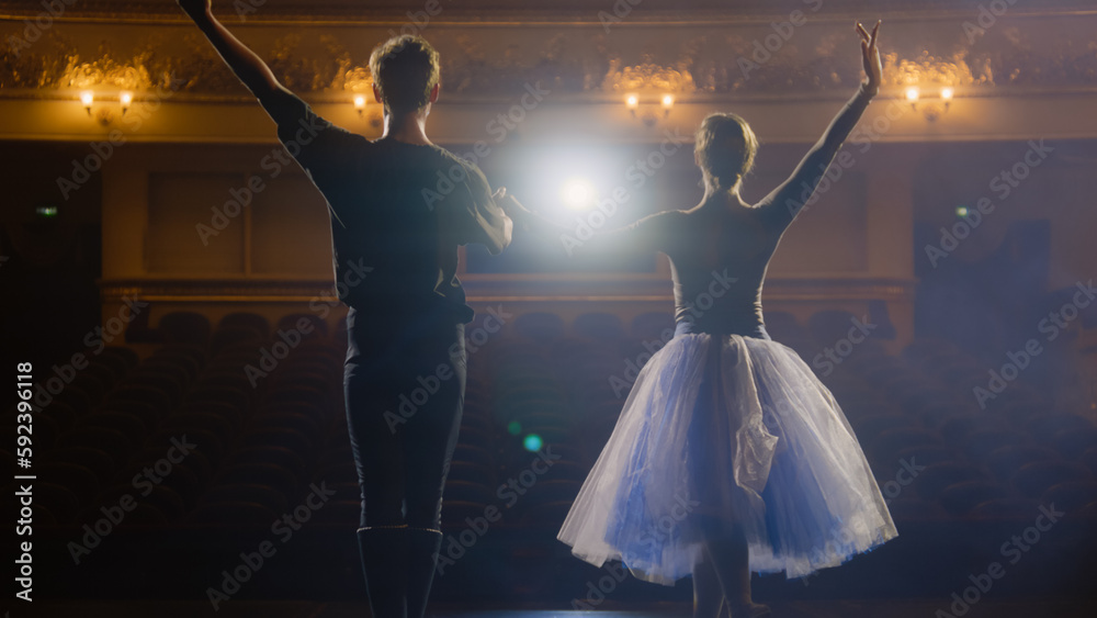 Ballet dancers bowing during choreography rehearsal on classic theater ...
