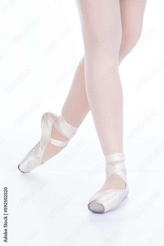 En Pointe CORRECT turn out front on teachers perspective Young female ballet dancer showing ...