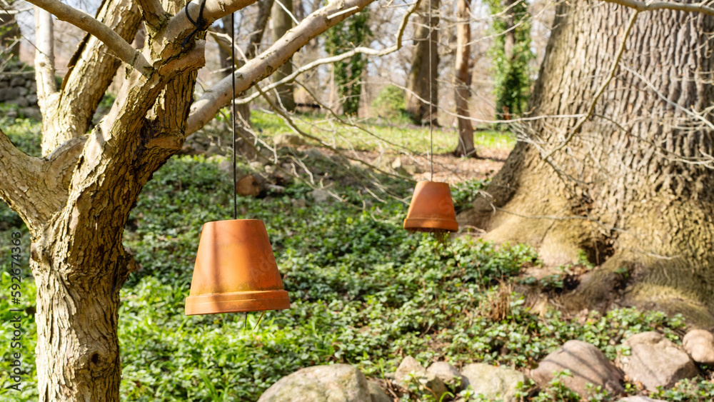 Houses for bumblebees in ceramic pots with straw. Inverted flower pots ...
