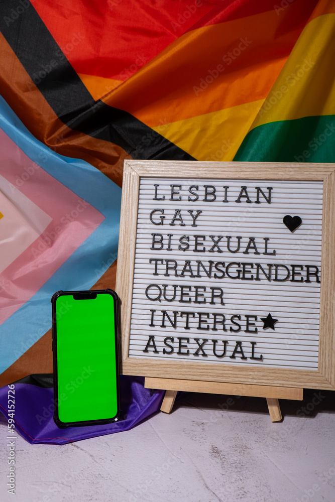 Stock-Foto „Mobile phone with chroma key on Rainbow LGBTQIA flag made ...
