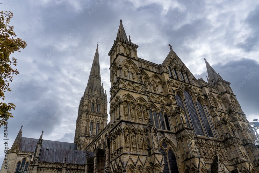 Western front of Salisbury Cathedral in England. Statues of angels, Old ...