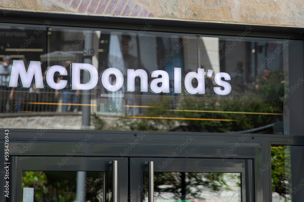 McDonald's sign text and brand logo on windows facade Restaurant ...