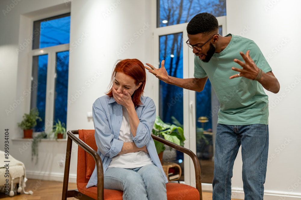 Abusive relationships. Interracial unhappy family couple come arguing ...