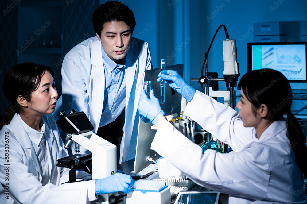 Professional health care researchers working in a medical science ...